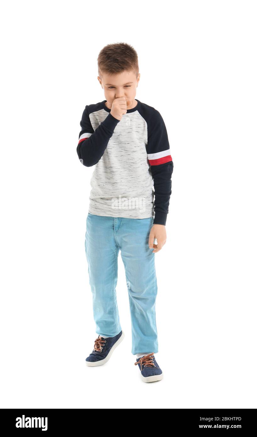 Ill coughing little boy on white background Stock Photo - Alamy