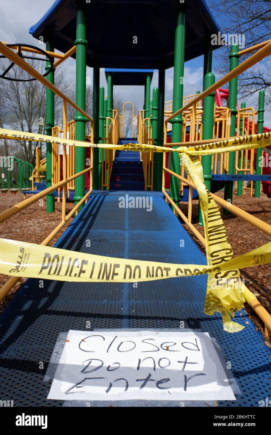 Closed do not enter sign with police line do not cross barricade tape ...