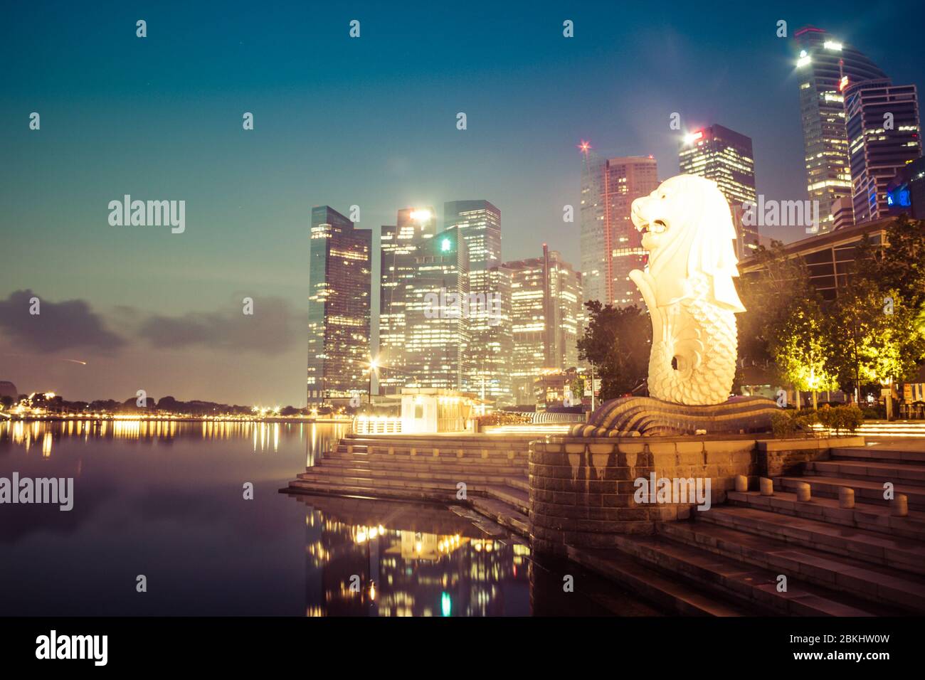 The Merlion in Singapore with the city skyline in the morning Stock ...