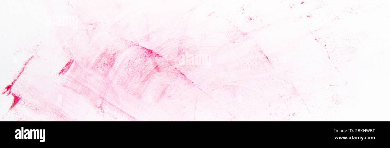 Smeared dry pink paint on white background Stock Photo - Alamy