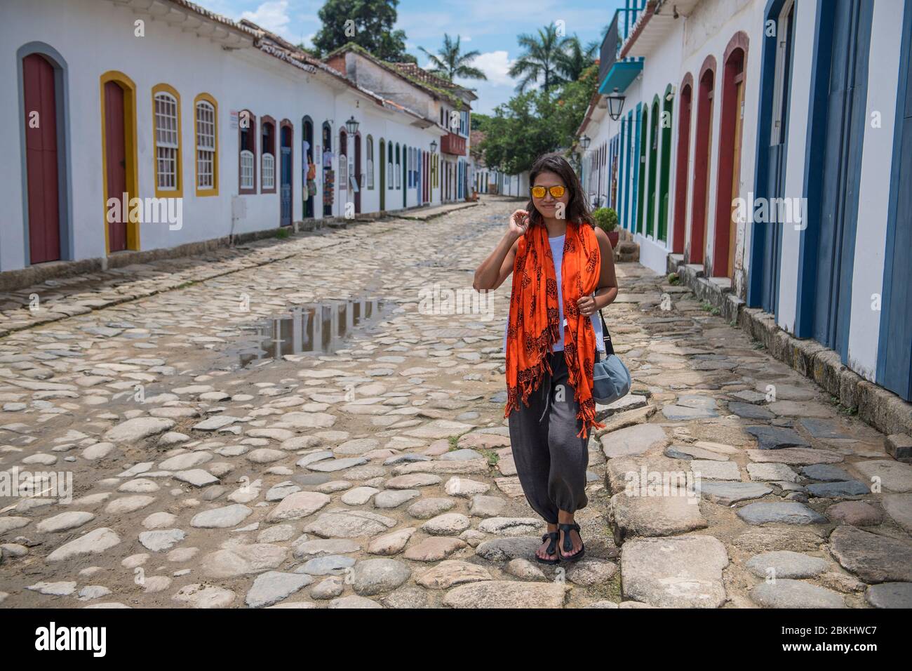 woman walking through the streets of Paraty in Brazil Stock Photo - Alamy