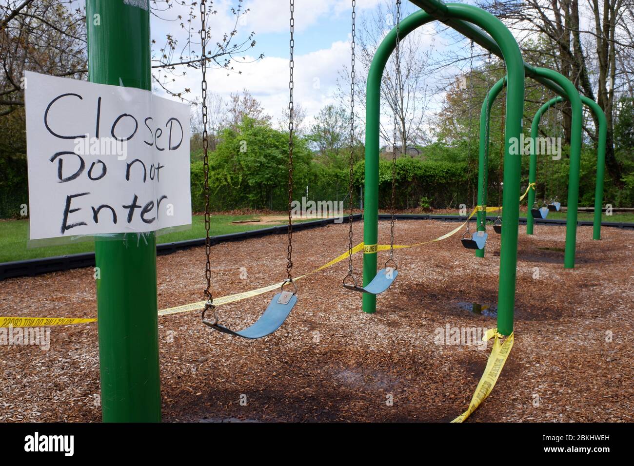 Closed do not enter sign with police line do not cross barricade tape ...