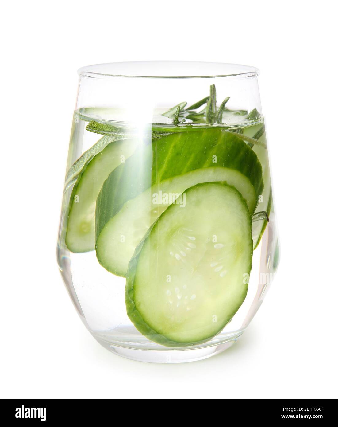 Glass of cucumber infused water on white background Stock Photo - Alamy