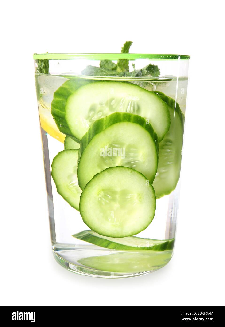 Glass of cucumber infused water on white background Stock Photo - Alamy
