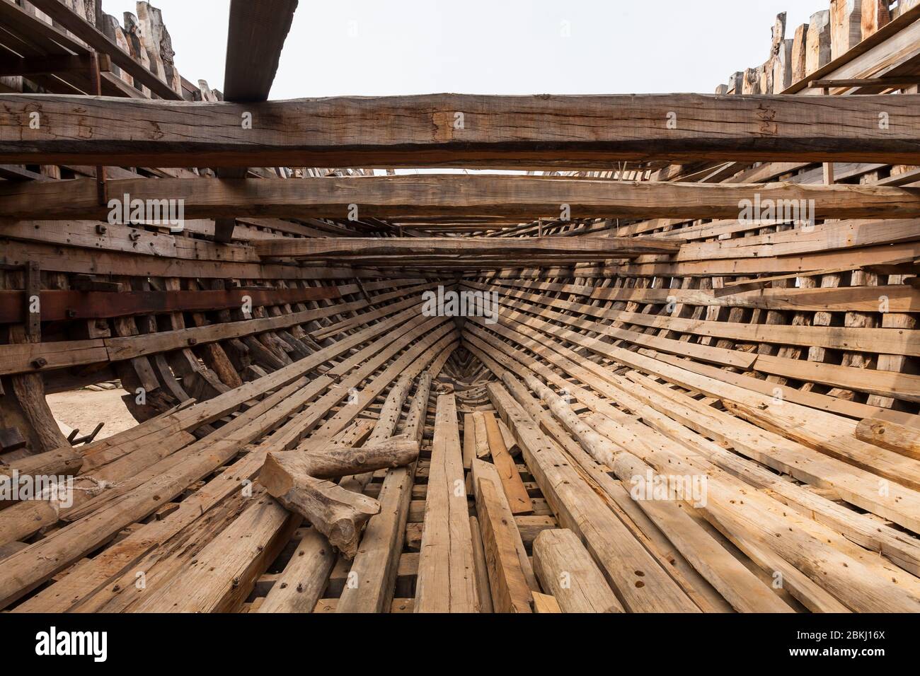 India, Gujarat State, Mandvi, shipyards, dhow under construction, view ...