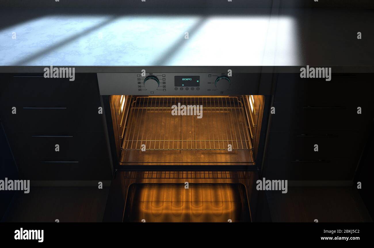 A look across a clean kitchen with cupboards and an open empty hot oven ...