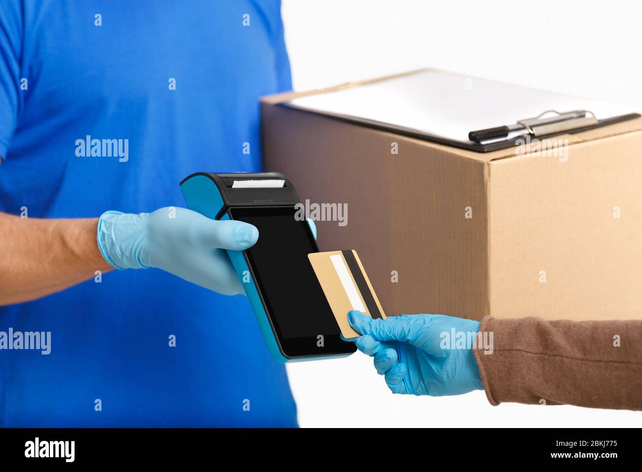 Contactless terminal for payment of courier services Stock Photo - Alamy