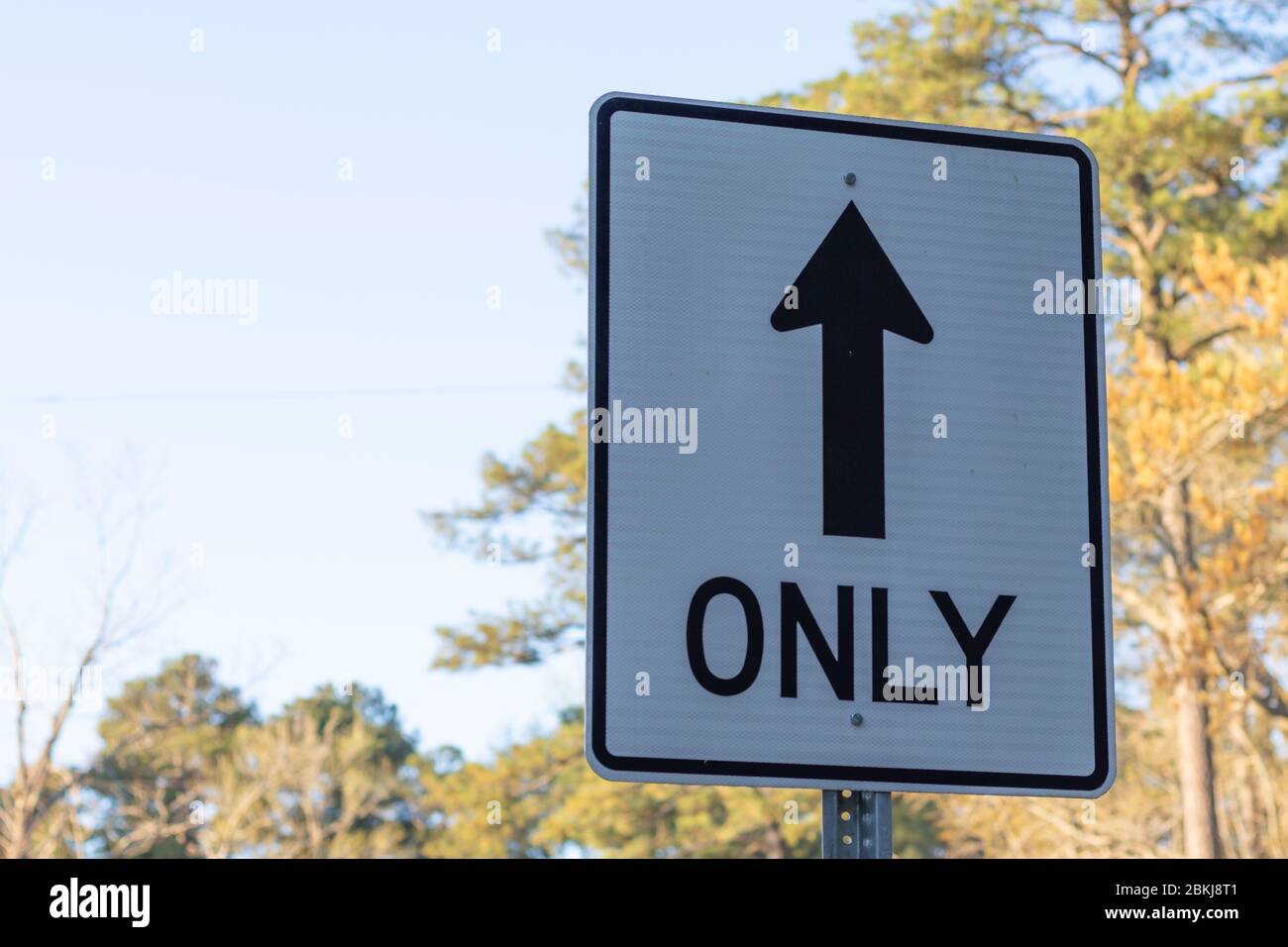 One directional arrow only sign on a bright sunny day Stock Photo - Alamy