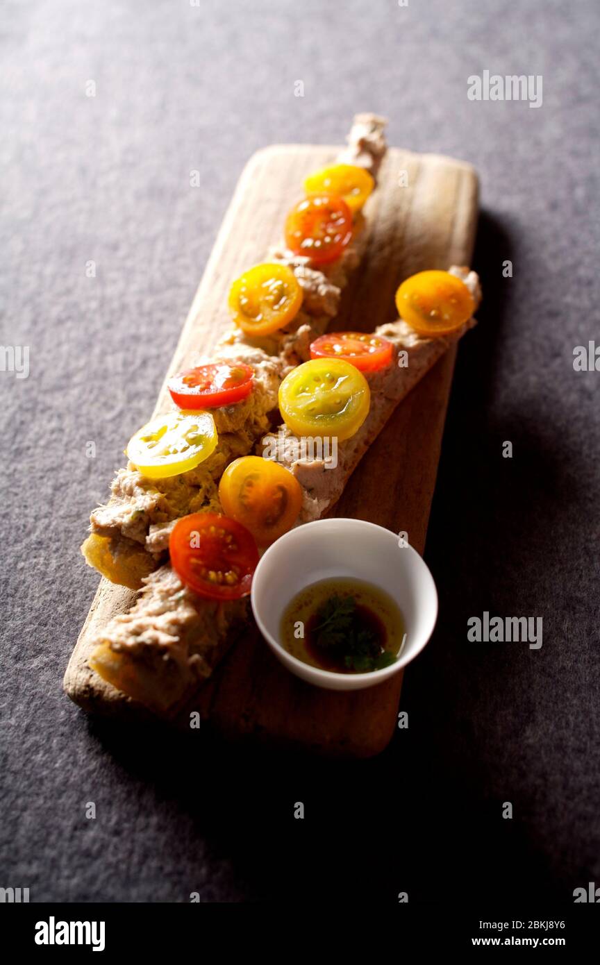 Tuna rillettes with cherry tomatoes Stock Photo - Alamy