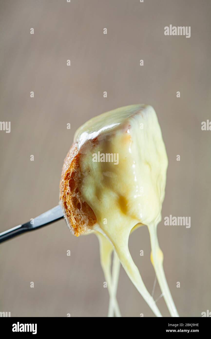 Savoyard cheese fondue Stock Photo - Alamy