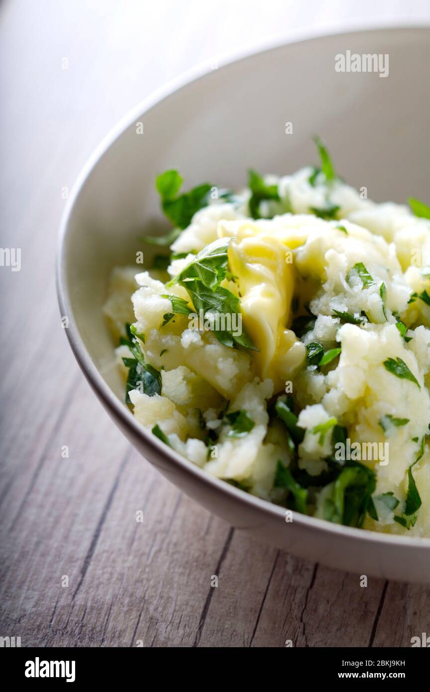 Mashed potato with parsley Stock Photo - Alamy