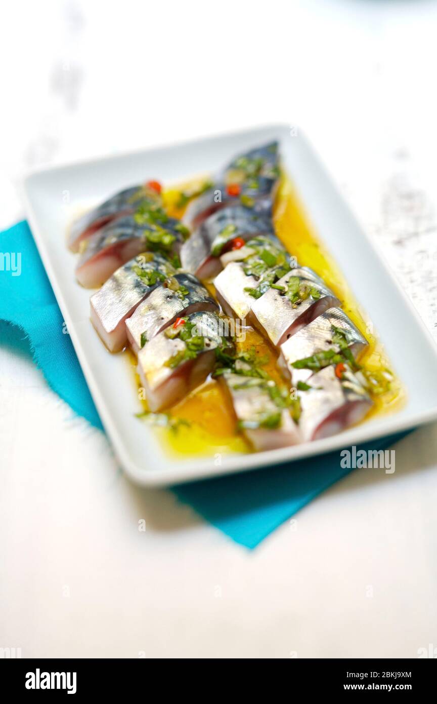 Mackerel marinated in herbs Stock Photo - Alamy