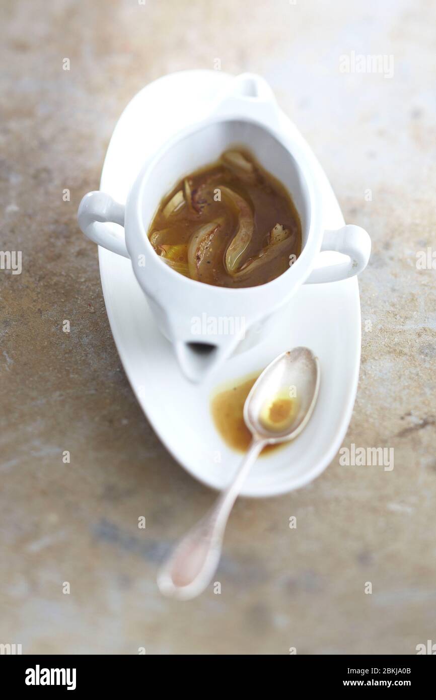 Roasted lamb cooking juices Stock Photo - Alamy