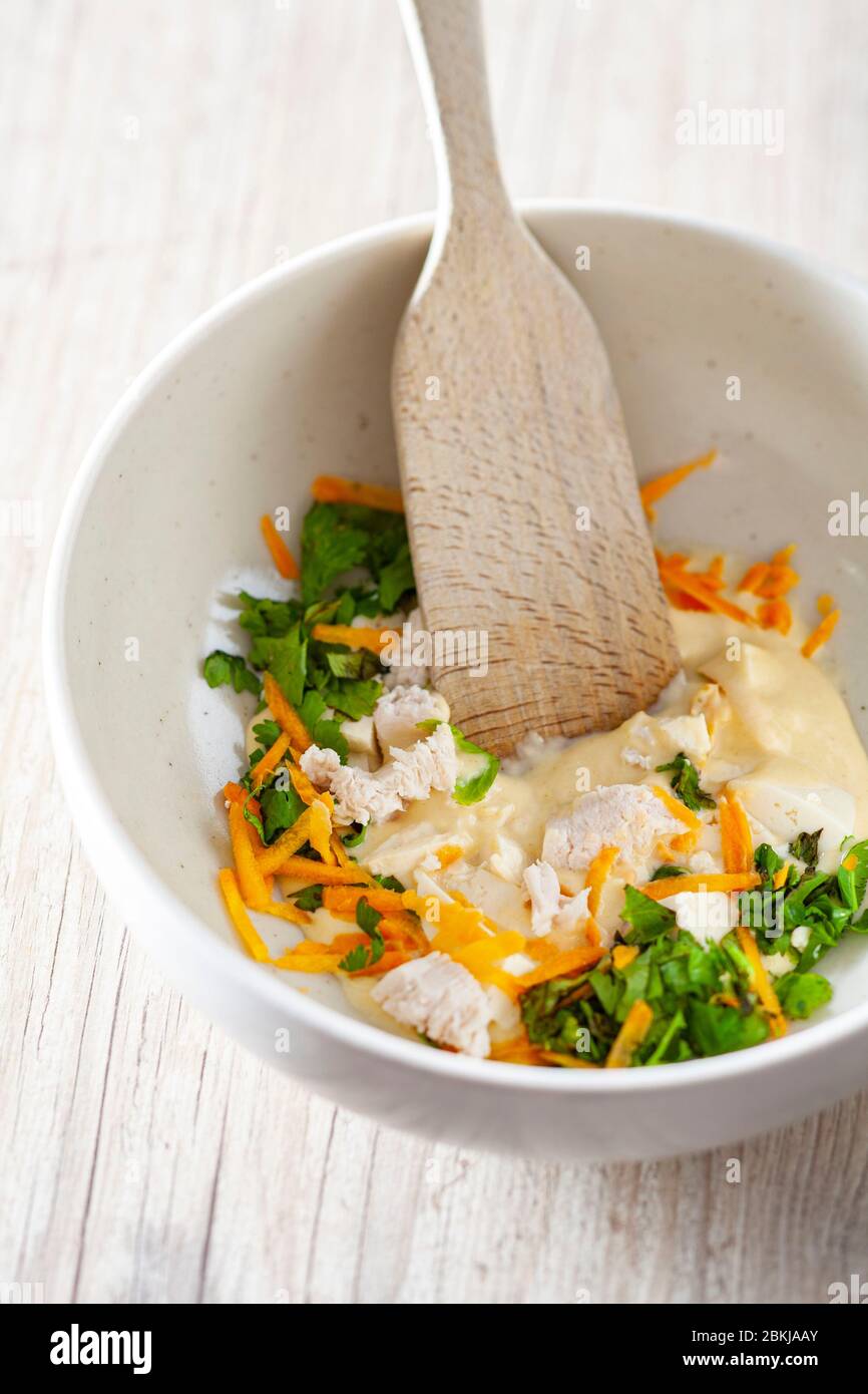 Preparation of chicken tofu blinis Stock Photo - Alamy