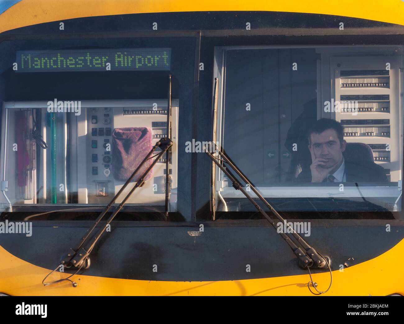 Train driver in the cab of a First Transpennine Express Siemens Desiro ...