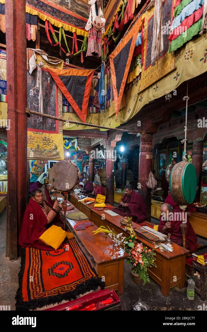 India, Jammu and Kashmir, Ladakh, Hemis Gompa, monks sitting and ...