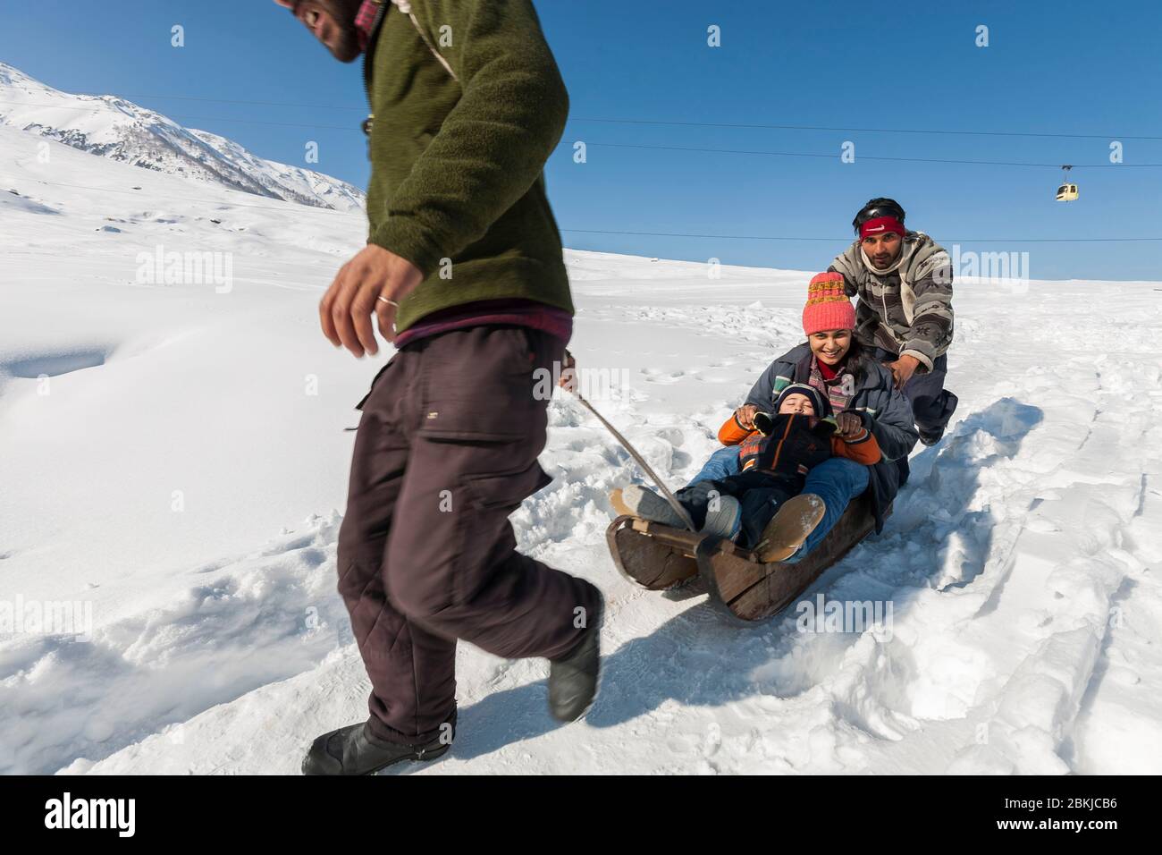 India, Jammu and Kashmir, Gulmarg, family of Indian tourists having fun ...