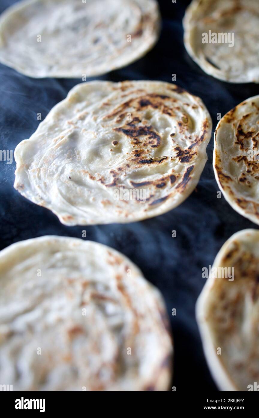 India, Kerala, cooking porotta in the street Stock Photo - Alamy