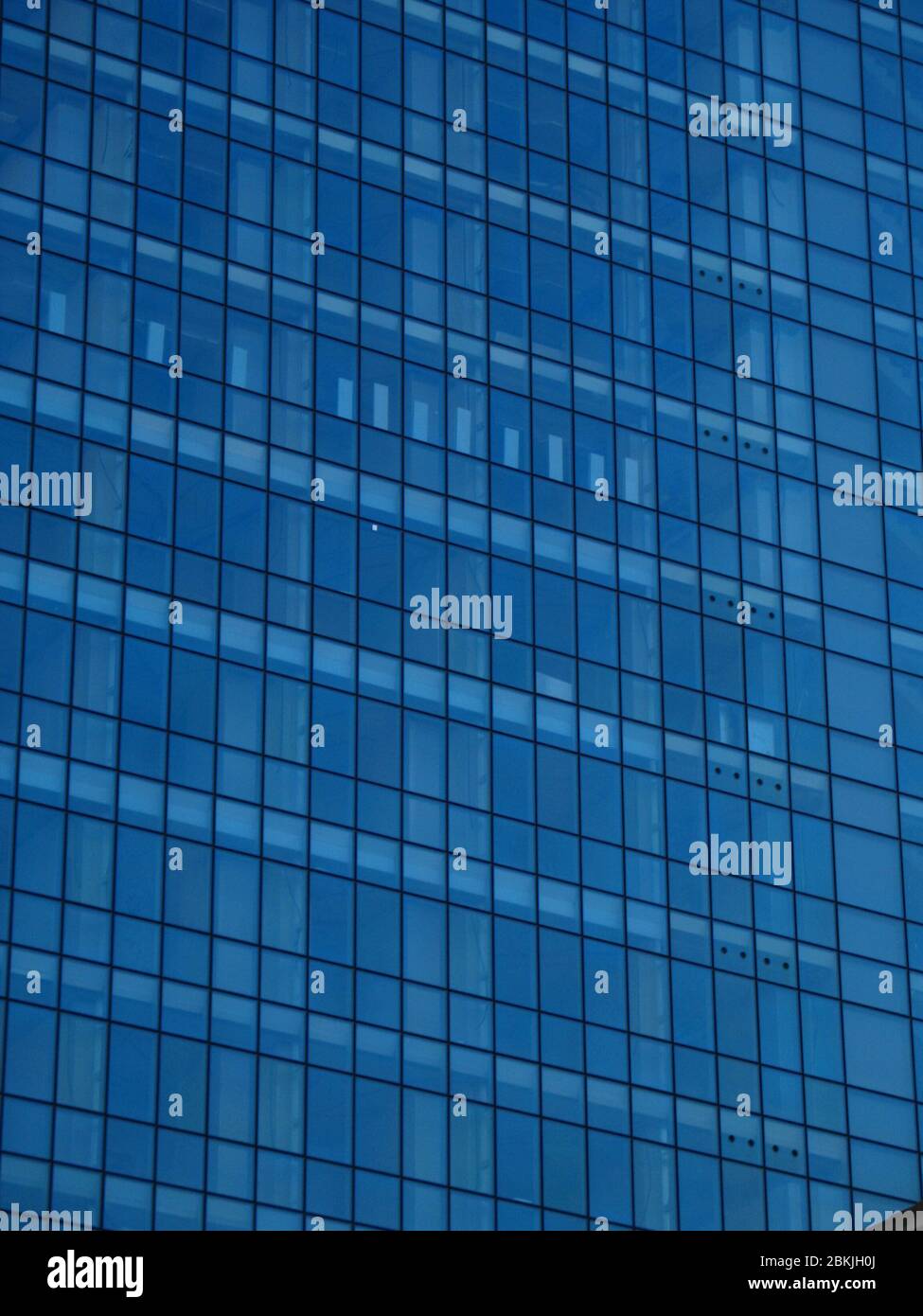glass building creating various shades of blue Stock Photo - Alamy