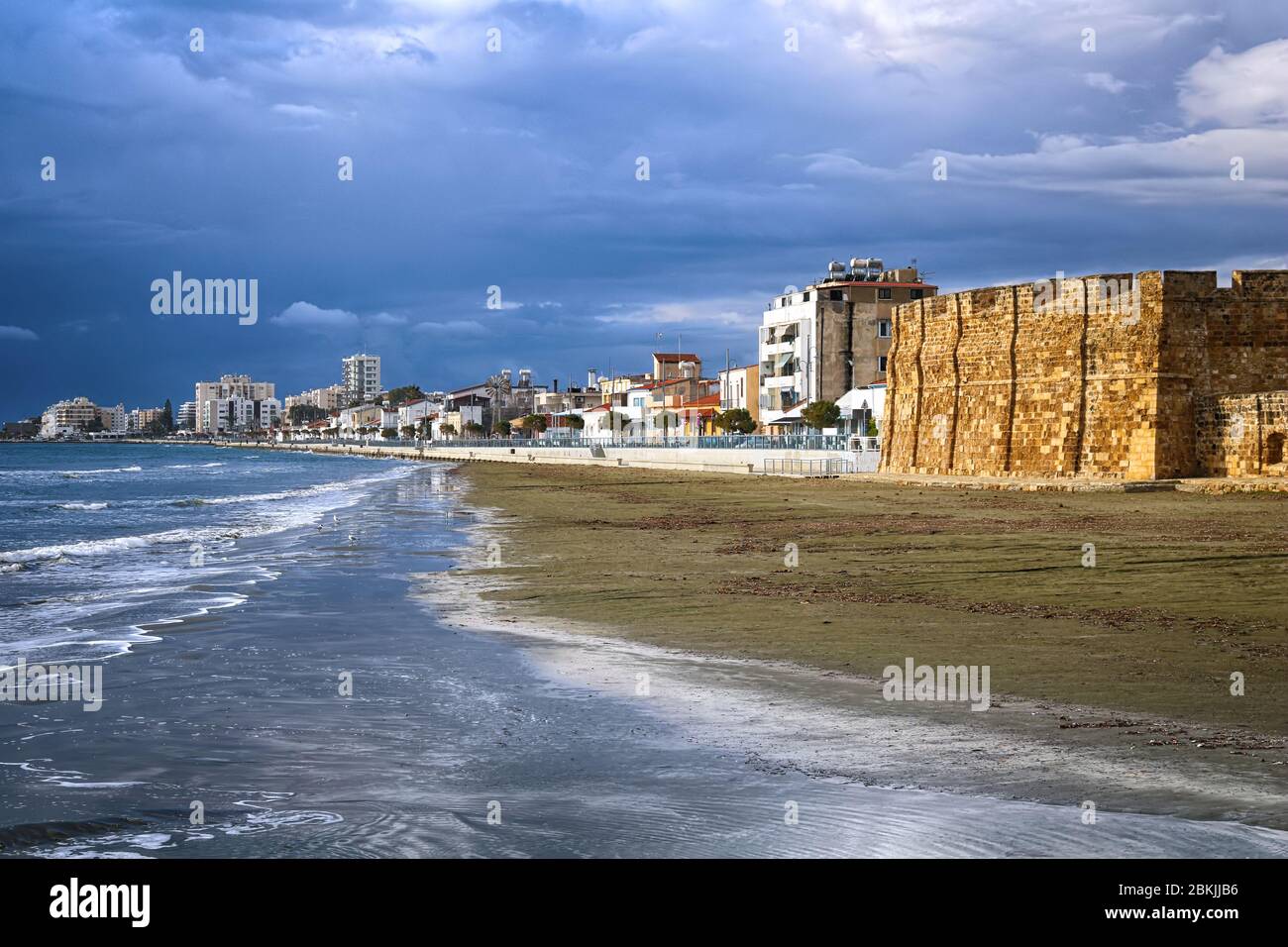Medieval castle, sea shore and embankment in Larnaca, Cyprus. Rainy ...