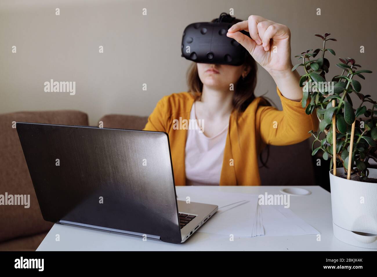 The girl communicates with friends using augmented reality. In focus is ...