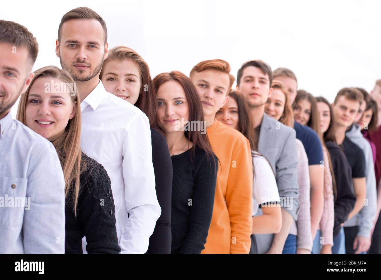 group of diverse young people standing in line Stock Photo - Alamy