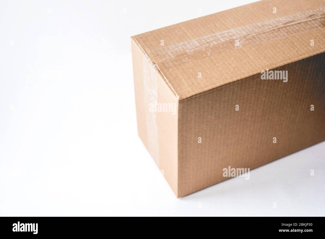Cardboard box on white background Stock Photo - Alamy