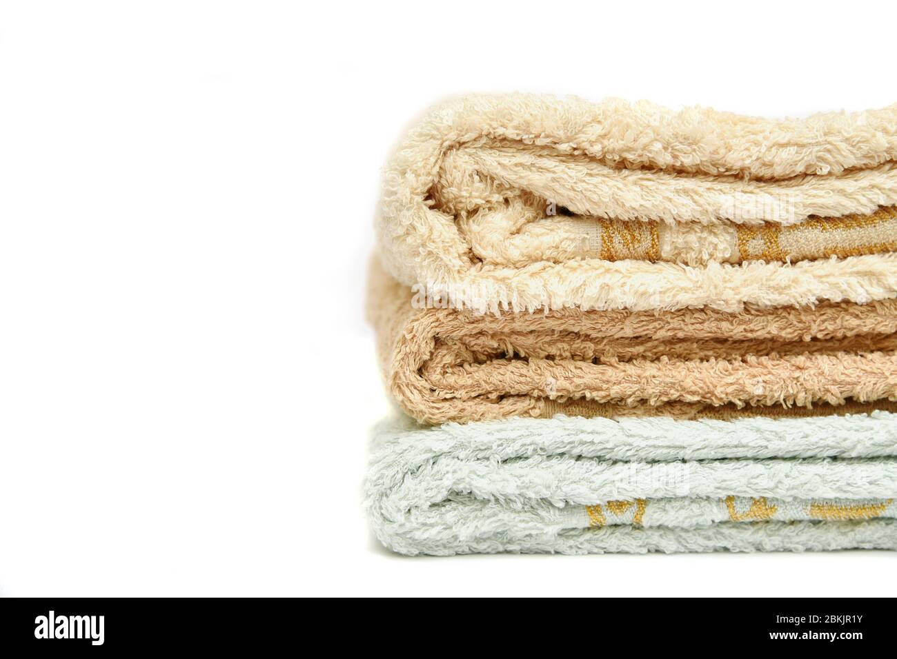 Stack of clean soft towels isolated in white background Stock Photo - Alamy