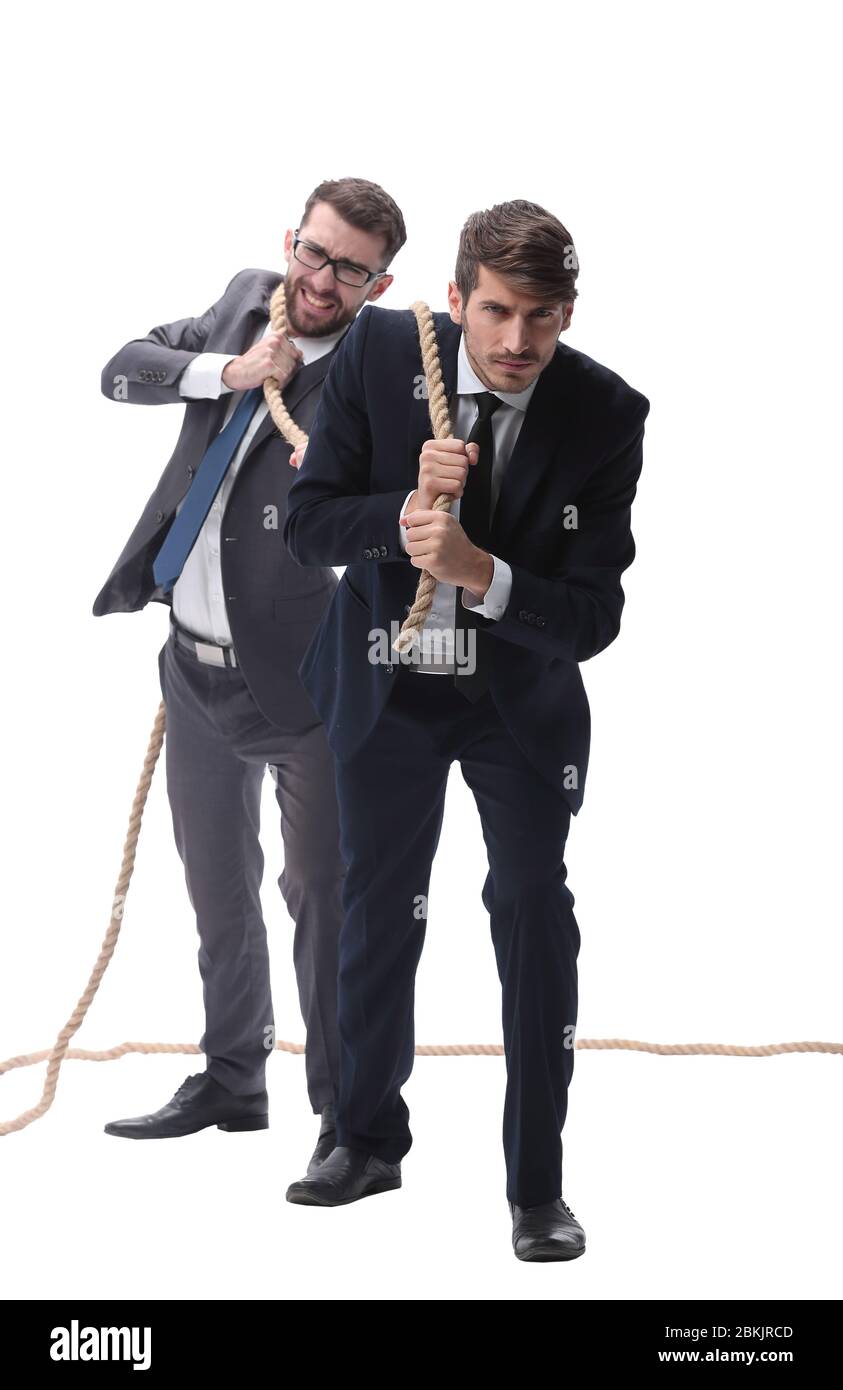 full length . two businessmen pulling a long rope Stock Photo - Alamy