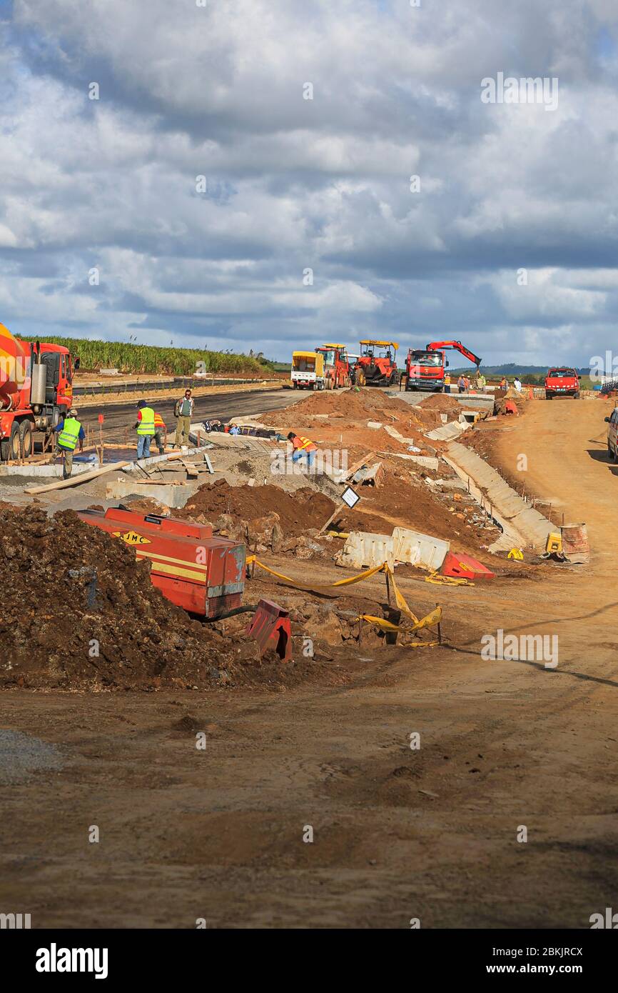 Mauritius, June 2009 - Construction of a new road with workmen, heavy ...