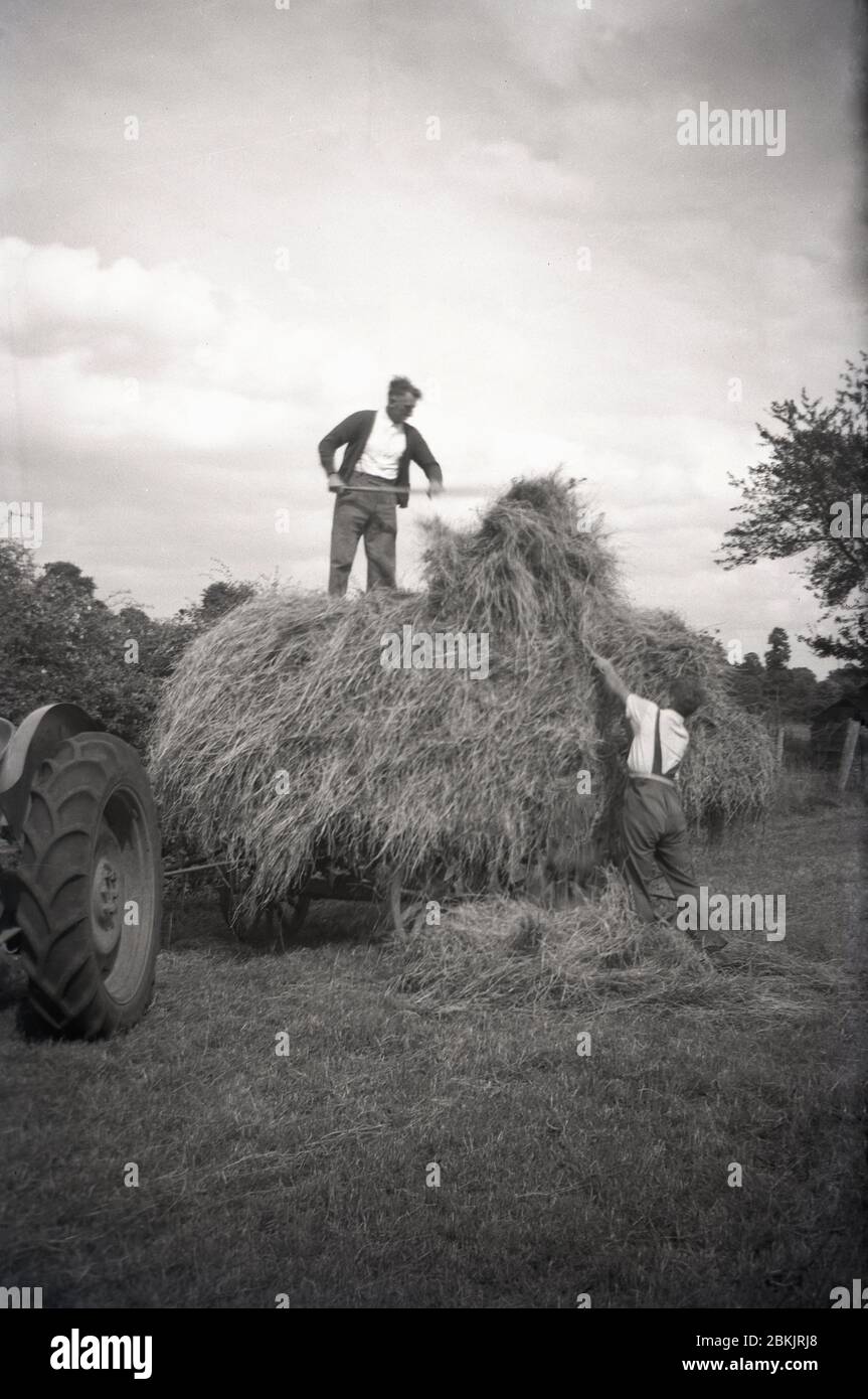 Loading hay hi-res stock photography and images - Alamy