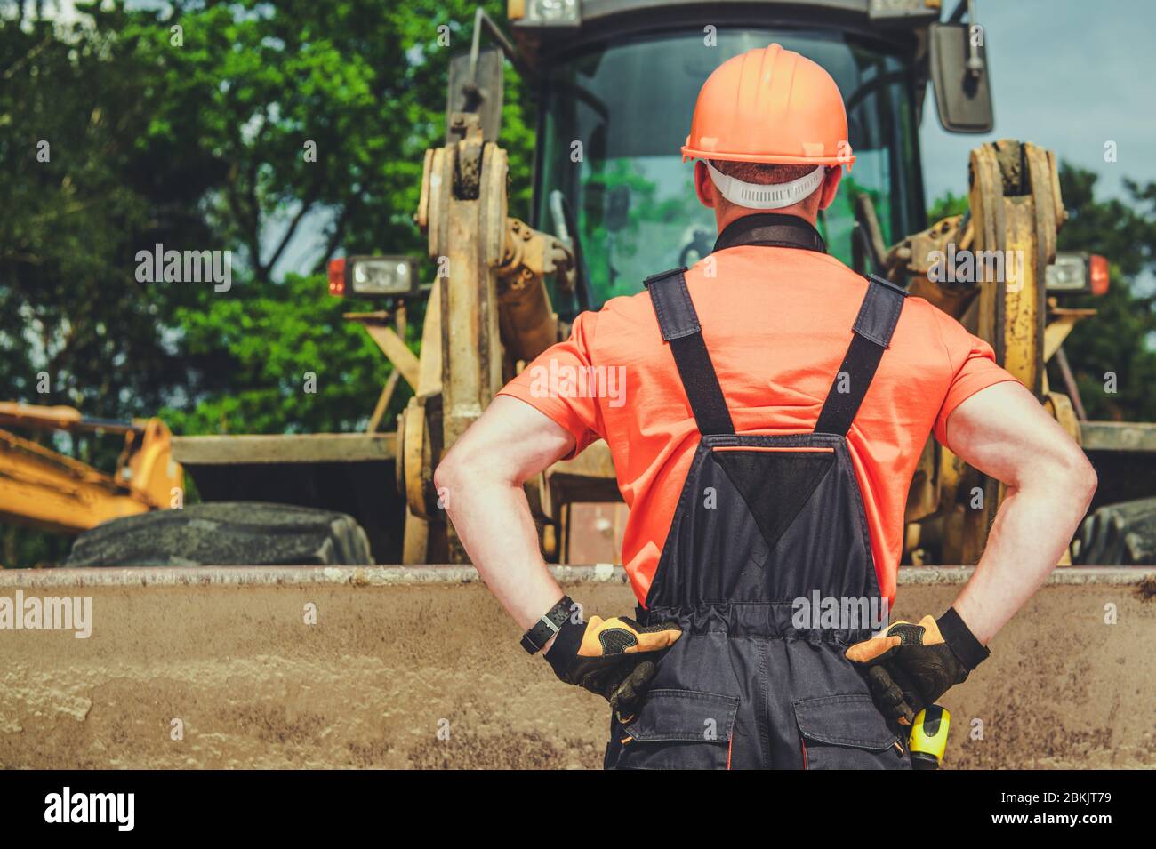 Backhoe Male Operator Inspects Bulldozer Before Staring Job Stock Photo ...