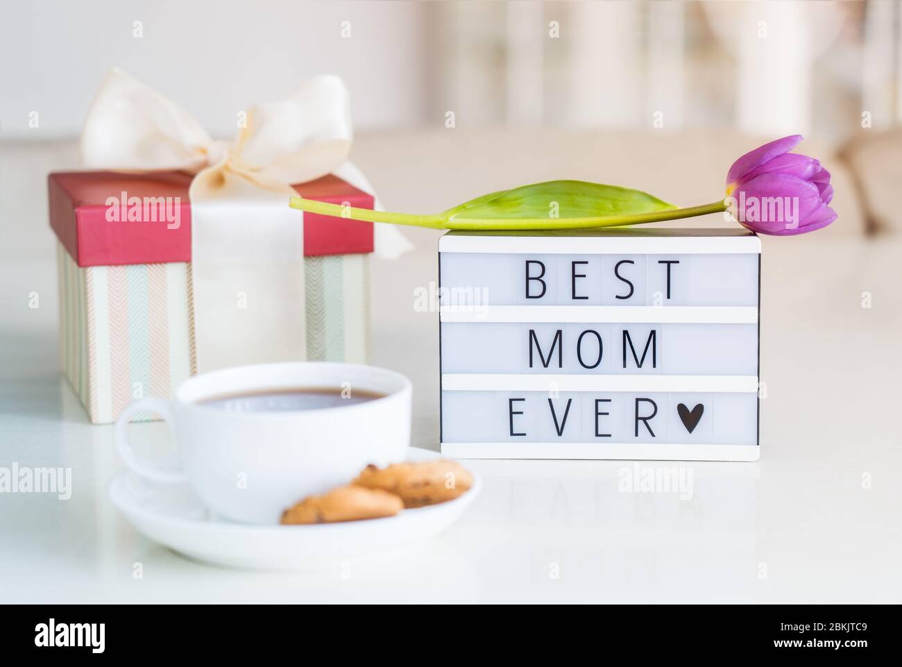 Mother's day background. Morning suprise - cup of tea with cookies ...