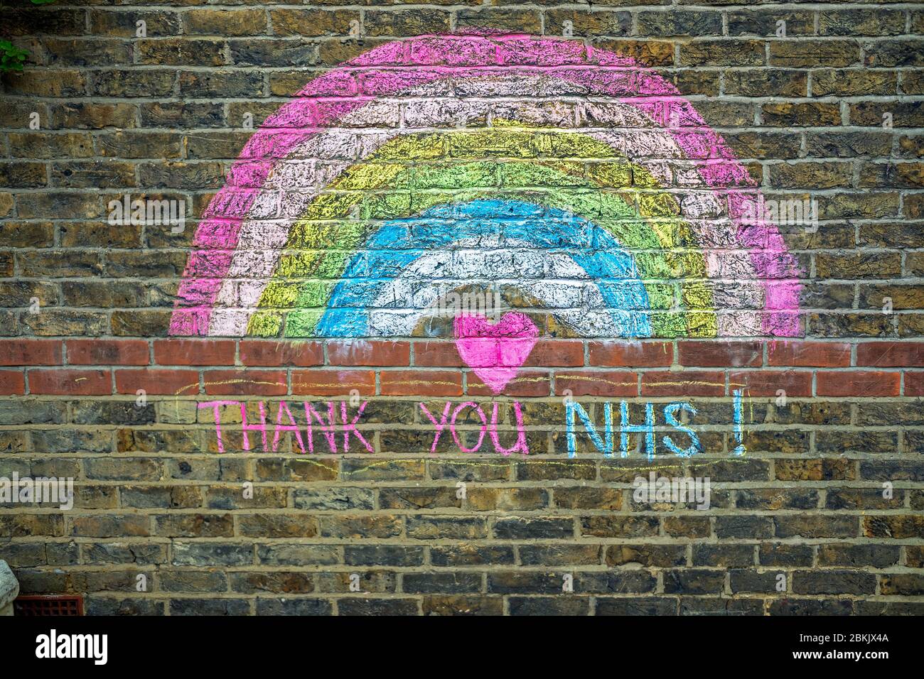 Rainbow NHS Message in Chalk on a Wall Stock Photo - Alamy