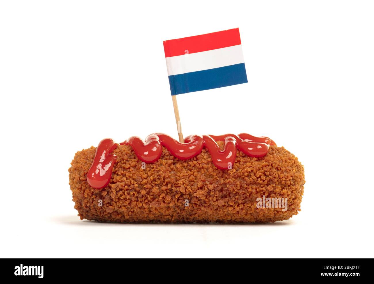 Brown crusty dutch kroket with ketchup topping isolated on a white ...