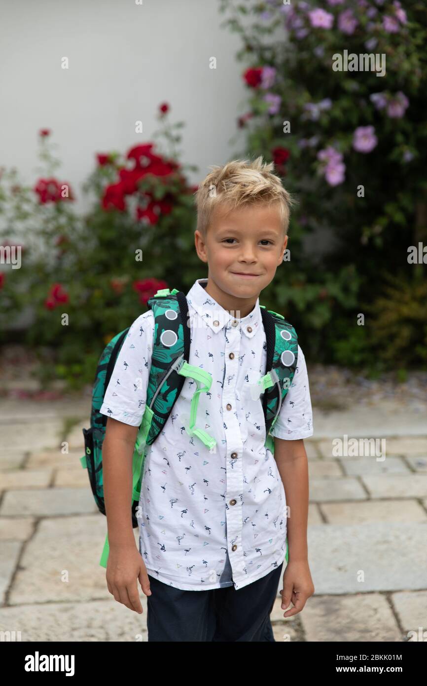 The little boy goes to school for the first time. Starting school ...