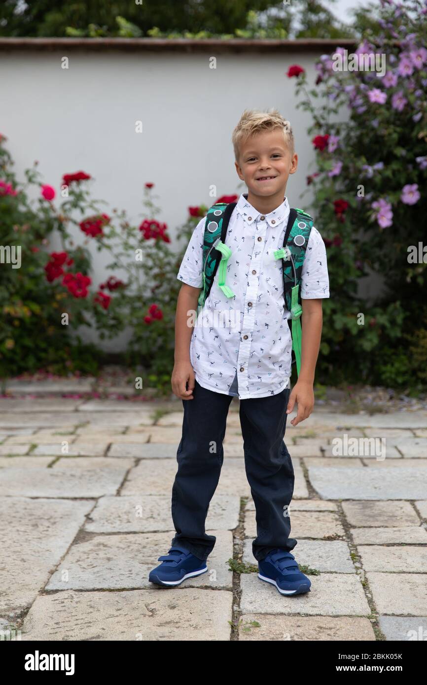 The little boy goes to school for the first time. Starting school ...