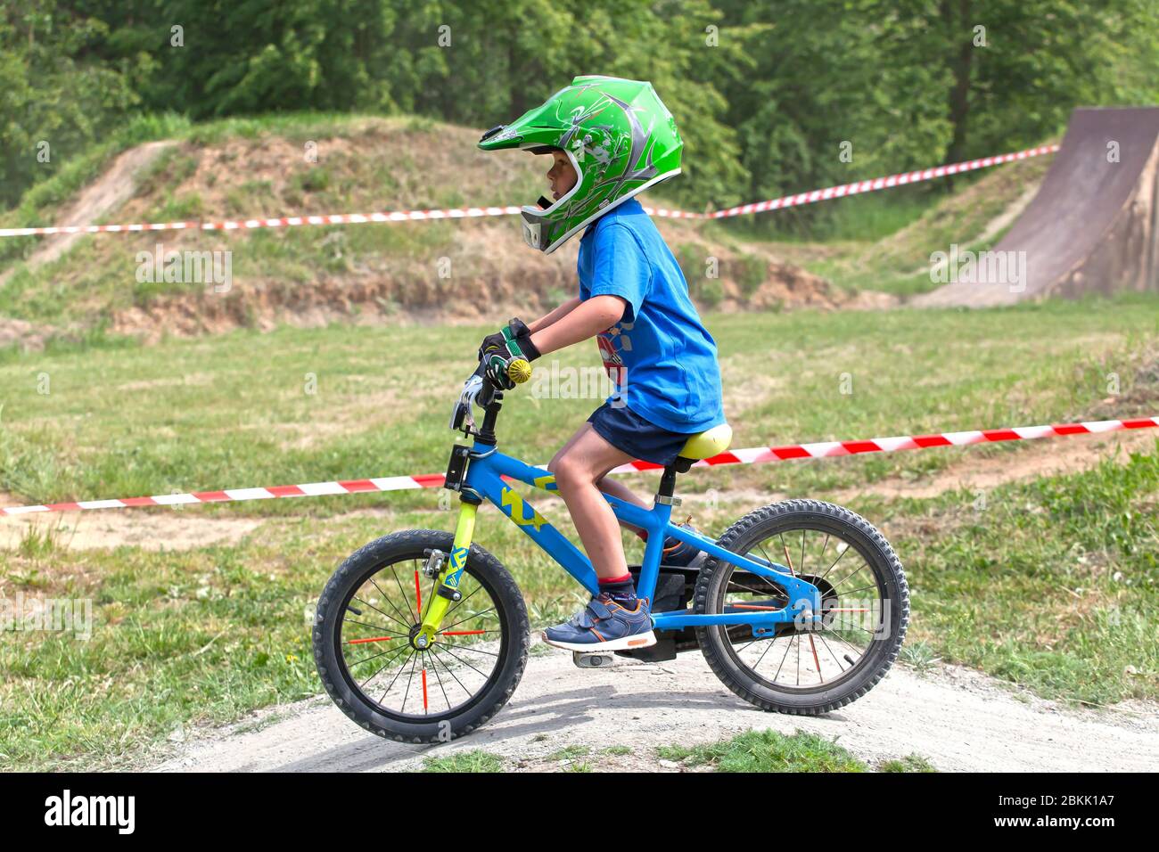 Little boy training on his bike Stock Photo - Alamy