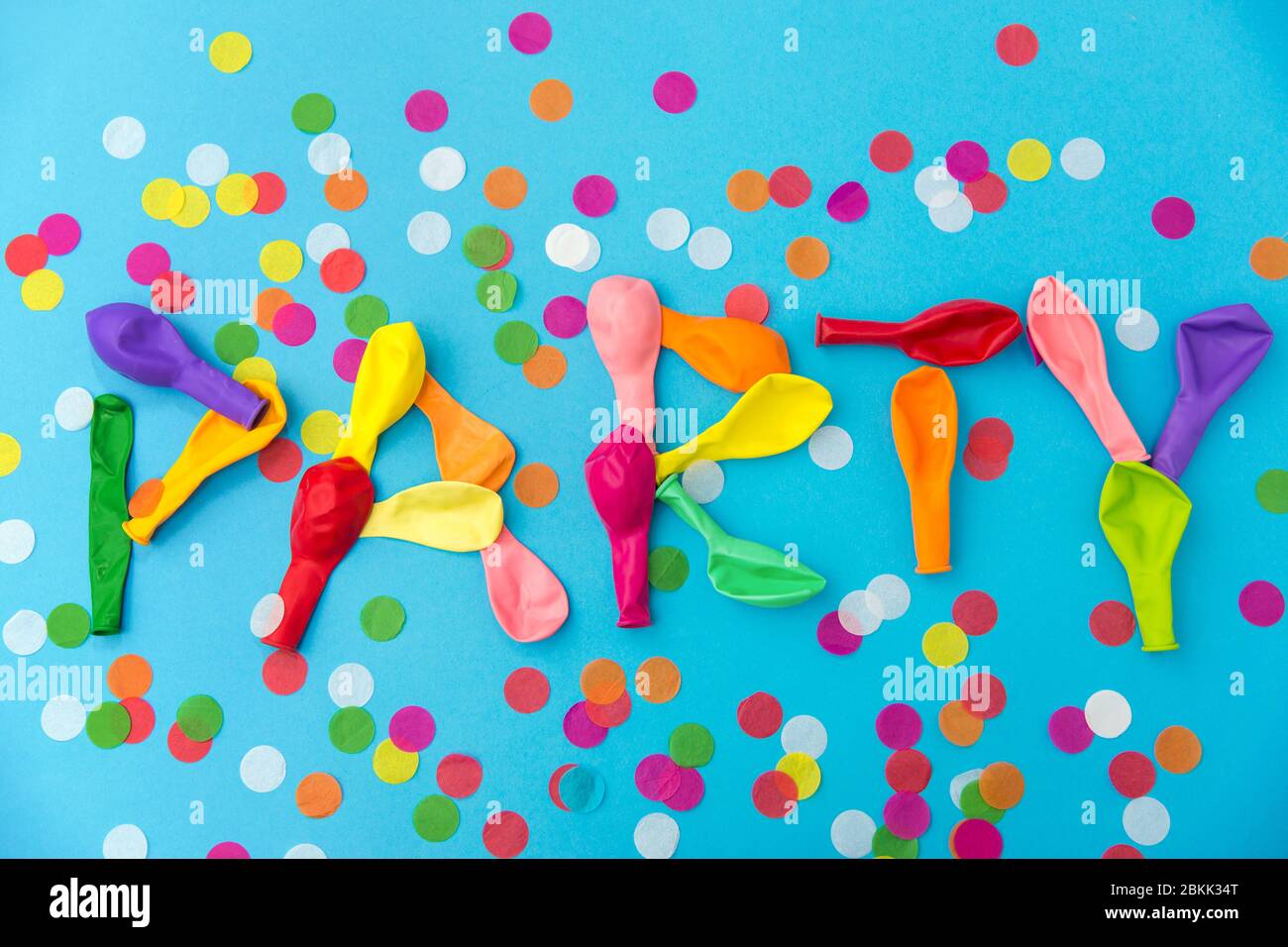 word party made of colorful balloons and confetti Stock Photo - Alamy