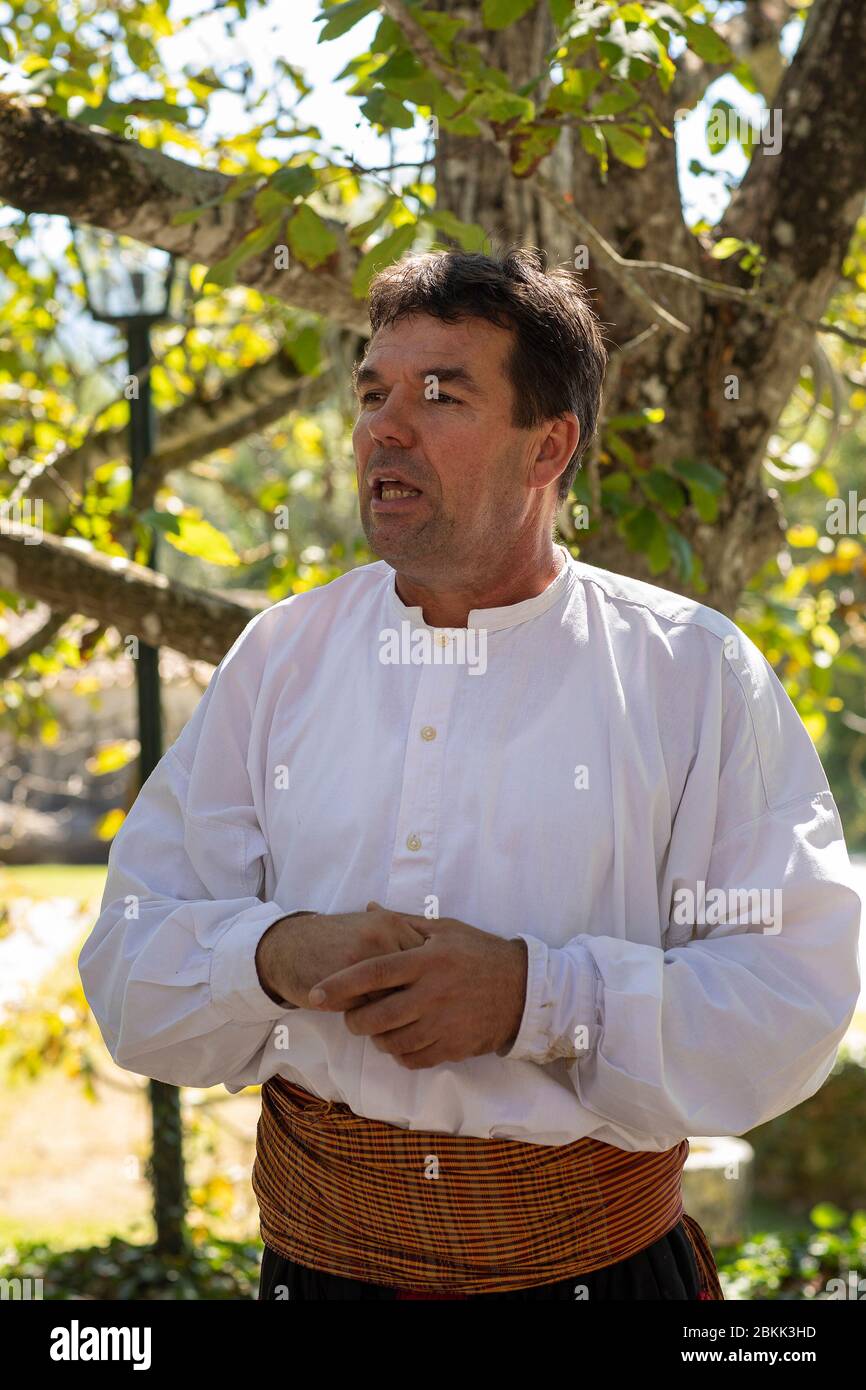 Cilipi, Croatia, September 14th 2019. A man talking and wearing a ...