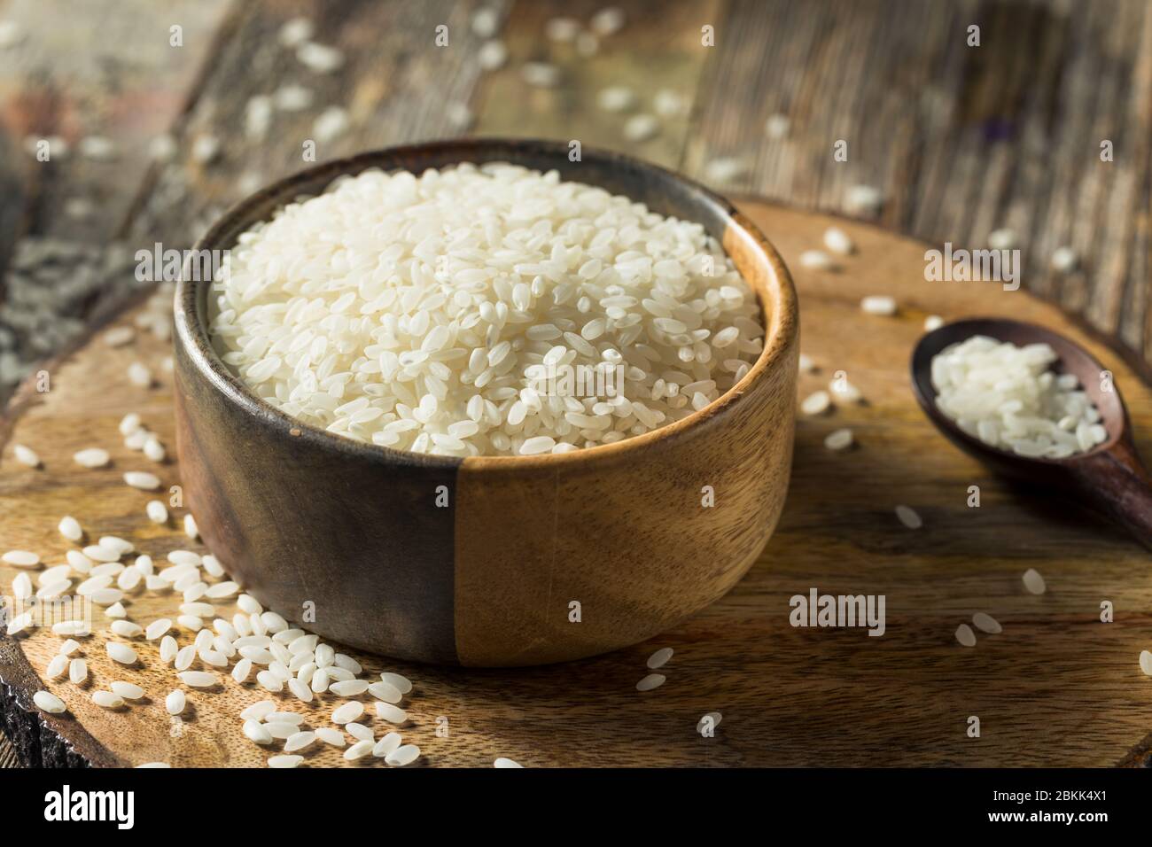Raw Organic Dry White Rice in a Bowl Stock Photo - Alamy