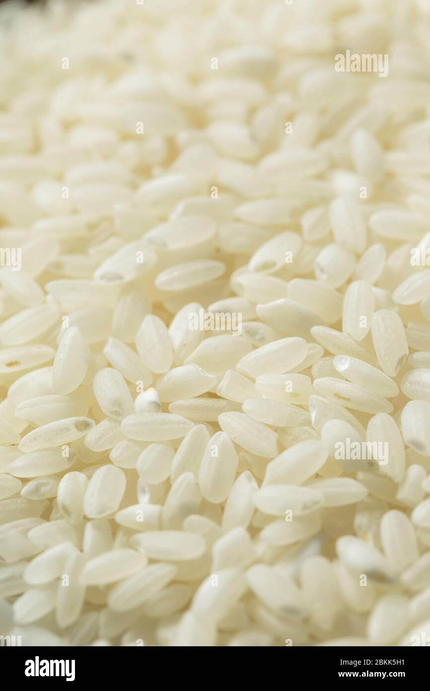 Raw Organic Dry White Rice in a Bowl Stock Photo - Alamy