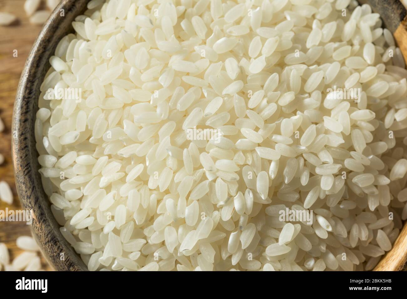 Raw Organic Dry White Rice in a Bowl Stock Photo - Alamy
