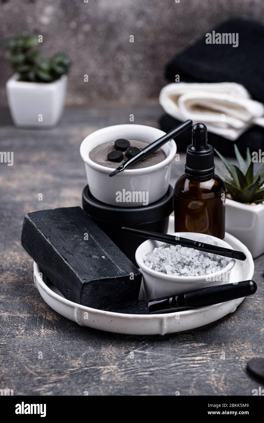 Set of black charcoal detox cosmetics Stock Photo - Alamy