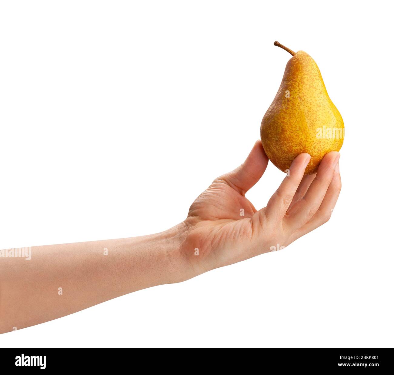 yellow pear in hand path isolated on white Stock Photo - Alamy