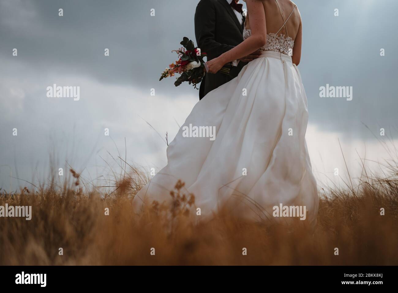 two married couple holding each other Stock Photo - Alamy