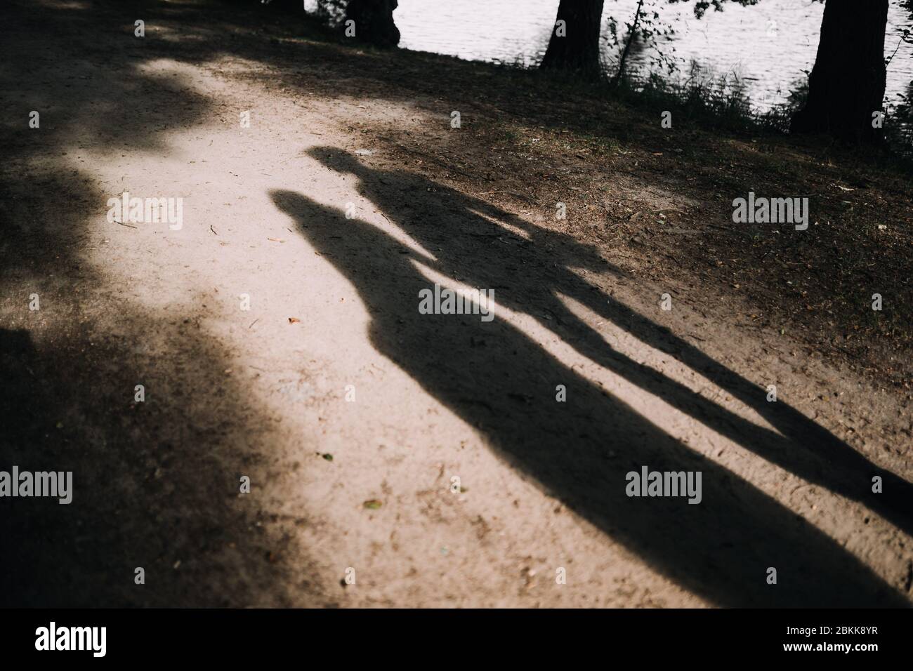 married couples shadow on the floor Stock Photo - Alamy
