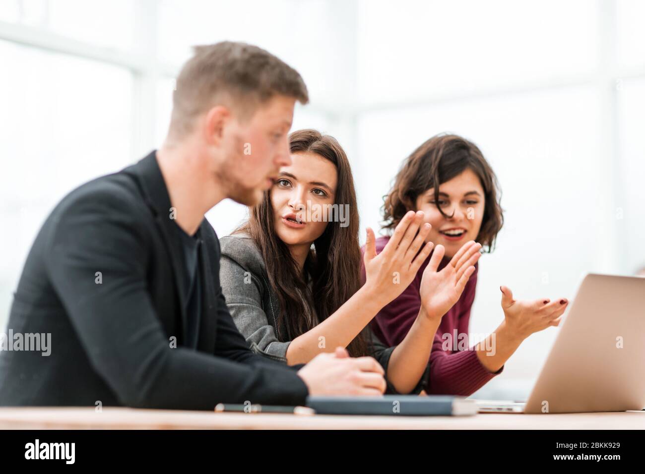 Group employees discussing something hi-res stock photography and ...
