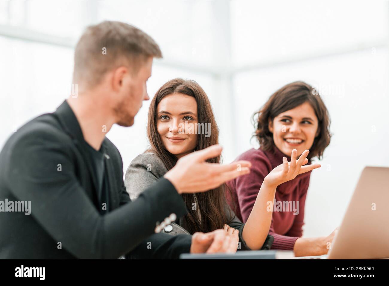 Group employees discussing something hi-res stock photography and ...