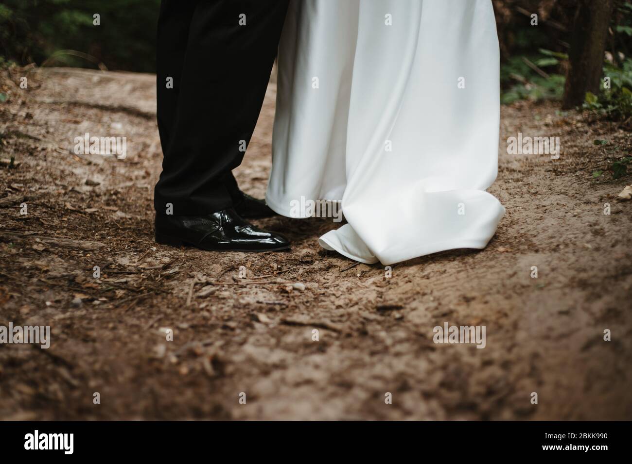 a married couples feet on the road Stock Photo - Alamy